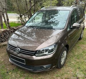 Brown Volkswagen Touran 2014 in Klaipeda, with an engine capacity of 1.20 L and mileage of 246 thousand km for 3400 €, photo  on AUTOMOTO.COM.LV