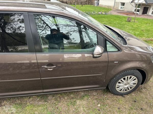 Brown Volkswagen Touran 2014 in Klaipeda, with an engine capacity of 1.20 L and mileage of 246 thousand km for 3400 €, photo 3 on AUTOMOTO.COM.LV