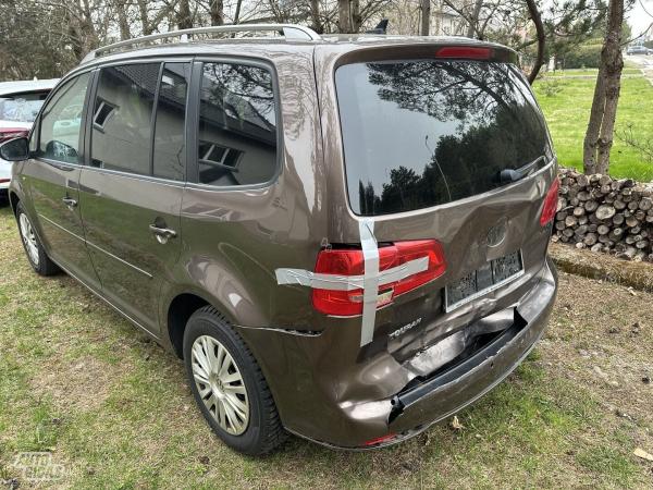 Brown Volkswagen Touran 2014 in Klaipeda, with an engine capacity of 1.20 L and mileage of 246 thousand km for 3400 €, photo 7 on AUTOMOTO.COM.LV