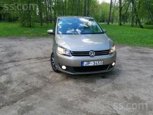 Brūns Volkswagen Touran 2014 Ogre, ar dzinēja tilpumu 1.60 L un nobraukumu 251 tūkst. km par 5000 €, foto  vietnē AUTOMOTO.COM.LV