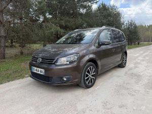 Brūns Volkswagen Touran 2014 Viļņa, ar dzinēja tilpumu 1.60 L un nobraukumu 218 tūkst. km par 7600 €, foto  vietnē AUTOMOTO.COM.LV
