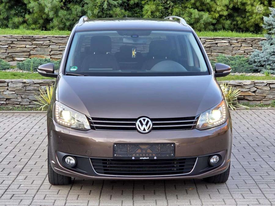 Brown Volkswagen Touran 2014 in Kedainiai, with an engine capacity of 1.97 L and mileage of 248 thousand km for 7850 €, photo 3 on AUTOMOTO.COM.LV