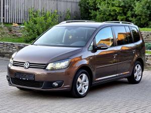 Brown Volkswagen Touran 2014 in Kedainiai, with an engine capacity of 1.97 L and mileage of 248 thousand km for 7850 €, photo 4 on AUTOMOTO.COM.LV