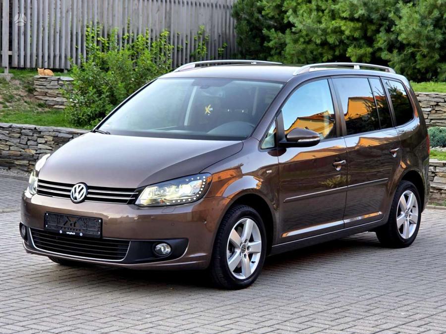 Brown Volkswagen Touran 2014 in Kedainiai, with an engine capacity of 1.97 L and mileage of 248 thousand km for 7850 €, photo 4 on AUTOMOTO.COM.LV
