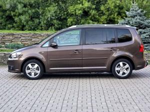 Brown Volkswagen Touran 2014 in Kedainiai, with an engine capacity of 1.97 L and mileage of 248 thousand km for 7850 €, photo 6 on AUTOMOTO.COM.LV