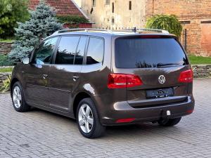 Brown Volkswagen Touran 2014 in Kedainiai, with an engine capacity of 1.97 L and mileage of 248 thousand km for 7850 €, photo 7 on AUTOMOTO.COM.LV