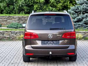 Brown Volkswagen Touran 2014 in Kedainiai, with an engine capacity of 1.97 L and mileage of 248 thousand km for 7850 €, photo 9 on AUTOMOTO.COM.LV