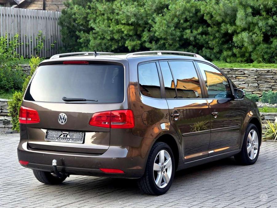 Brown Volkswagen Touran 2014 in Kedainiai, with an engine capacity of 1.97 L and mileage of 248 thousand km for 7850 €, photo 11 on AUTOMOTO.COM.LV