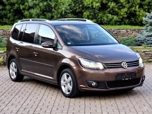 Brown Volkswagen Touran 2014 in Kedainiai, with an engine capacity of 1.97 L and mileage of 248 thousand km for 7850 €, photo 13 on AUTOMOTO.COM.LV