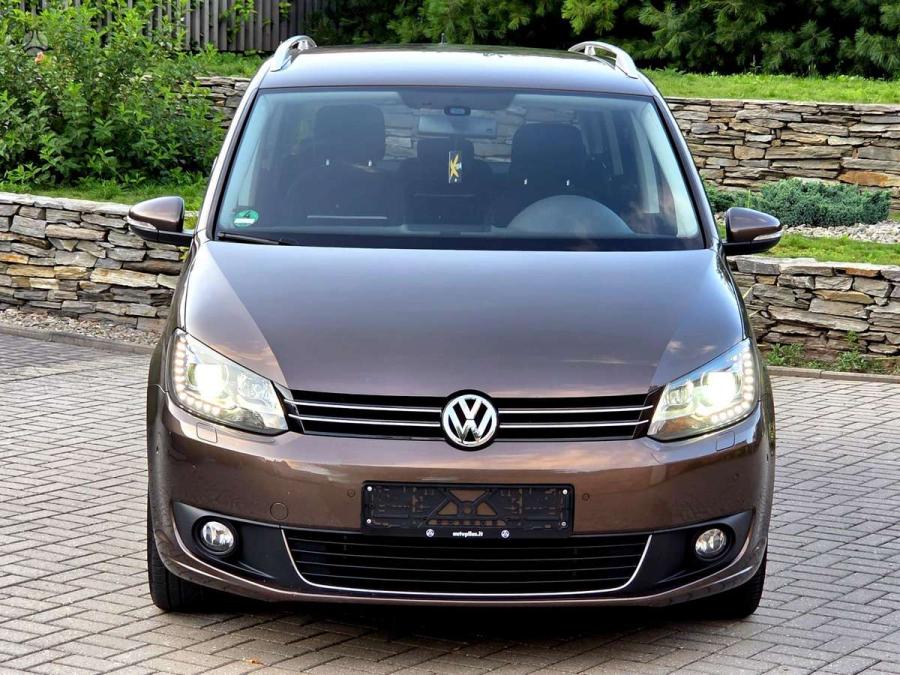 Brown Volkswagen Touran 2014 in Kedainiai, with an engine capacity of 1.97 L and mileage of 248 thousand km for 7850 €, photo 14 on AUTOMOTO.COM.LV