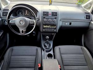 Brown Volkswagen Touran 2014 in Kedainiai, with an engine capacity of 1.97 L and mileage of 248 thousand km for 7850 €, photo 17 on AUTOMOTO.COM.LV
