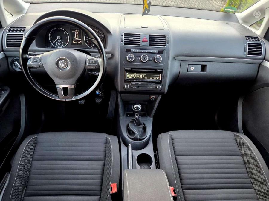 Brown Volkswagen Touran 2014 in Kedainiai, with an engine capacity of 1.97 L and mileage of 248 thousand km for 7850 €, photo 17 on AUTOMOTO.COM.LV