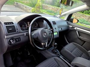 Brown Volkswagen Touran 2014 in Kedainiai, with an engine capacity of 1.97 L and mileage of 248 thousand km for 7850 €, photo 27 on AUTOMOTO.COM.LV
