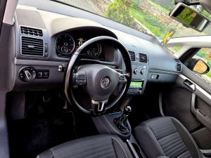 Brown Volkswagen Touran 2014 in Kedainiai, with an engine capacity of 1.97 L and mileage of 248 thousand km for 7850 €, photo 34 on AUTOMOTO.COM.LV
