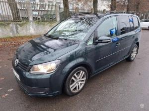Green Volkswagen Touran 2011 in Kaunas, with an engine capacity of 1.39 L and mileage of 210 thousand km for 4350 €, photo 3 on AUTOMOTO.COM.LV
