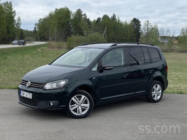 Green Volkswagen Touran 2012 in Ogre, with an engine capacity of 2.00 L and mileage of 289 thousand km for 7150 €, photo 2 on AUTOMOTO.COM.LV