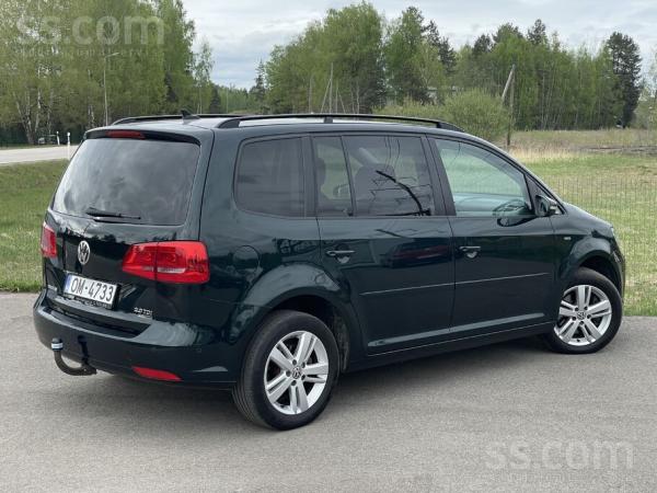 Green Volkswagen Touran 2012 in Ogre, with an engine capacity of 2.00 L and mileage of 289 thousand km for 7150 €, photo 7 on AUTOMOTO.COM.LV