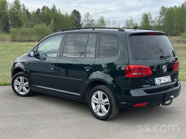 Green Volkswagen Touran 2012 in Ogre, with an engine capacity of 2.00 L and mileage of 289 thousand km for 7150 €, photo 9 on AUTOMOTO.COM.LV