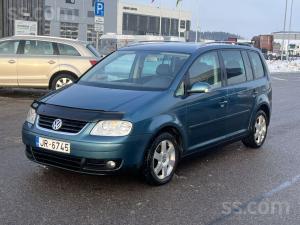 Pelēks Volkswagen Touran 2005 Rīga, ar dzinēja tilpumu 2.00 L un nobraukumu 400 tūkst. km par 1590 €, foto  vietnē AUTOMOTO.COM.LV
