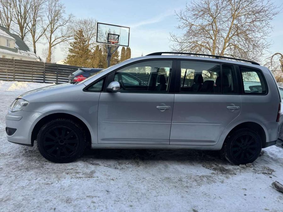 Grey Volkswagen Touran 2007 in Kaunas, with an engine capacity of 1.90 L and mileage of 307 thousand km for 2300 €, photo 5 on AUTOMOTO.COM.LV