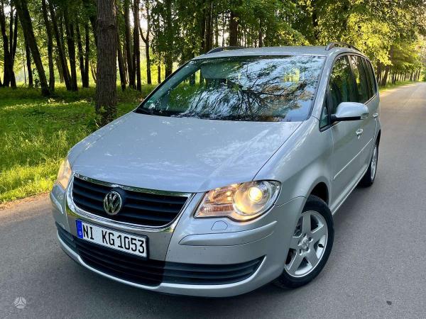 Pelēks Volkswagen Touran 2007 Kauņa, ar dzinēja tilpumu 2.00 L un nobraukumu 289 tūkst. km par 3800 €, foto 1 vietnē AUTOMOTO.COM.LV