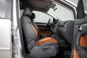 Grey Volkswagen Touran 2008 in Talsi, with an engine capacity of 2.00 L and mileage of 252 thousand km for 2990 €, photo 13 on AUTOMOTO.COM.LV