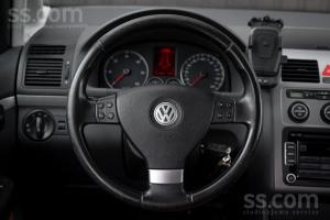 Grey Volkswagen Touran 2008 in Talsi, with an engine capacity of 2.00 L and mileage of 252 thousand km for 2990 €, photo 18 on AUTOMOTO.COM.LV