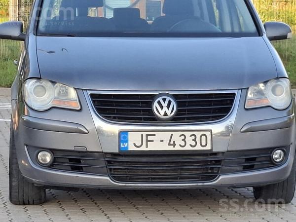 Pelēks Volkswagen Touran 2008 Saldus, ar dzinēja tilpumu 2.00 L un nobraukumu 402 tūkst. km par 1550 €, foto 6 vietnē AUTOMOTO.COM.LV
