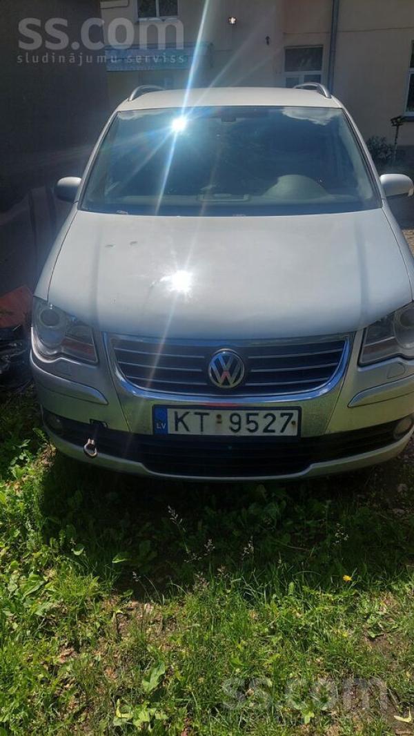 Grey Volkswagen Touran 2009 in Riga, with an engine capacity of 1.90 L and mileage of 0 thousand km for 500 €, photo 1 on AUTOMOTO.COM.LV