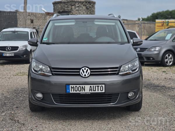 Grey Volkswagen Touran 2010 in Liepaja, with an engine capacity of 2.00 L and mileage of 298 thousand km for 5990 €, photo 3 on AUTOMOTO.COM.LV