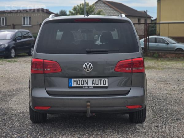 Grey Volkswagen Touran 2010 in Liepaja, with an engine capacity of 2.00 L and mileage of 298 thousand km for 5990 €, photo 6 on AUTOMOTO.COM.LV