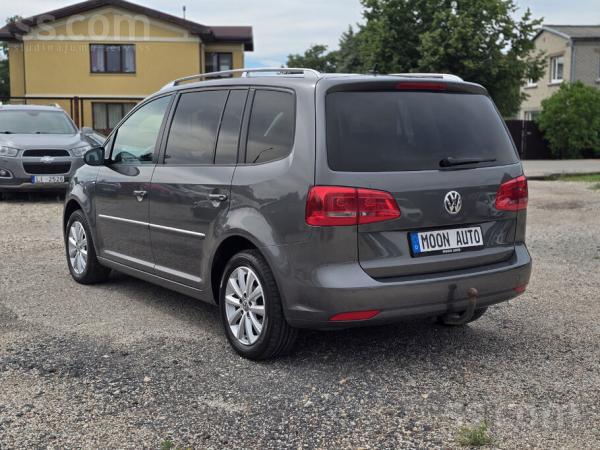 Grey Volkswagen Touran 2010 in Liepaja, with an engine capacity of 2.00 L and mileage of 298 thousand km for 5990 €, photo 7 on AUTOMOTO.COM.LV
