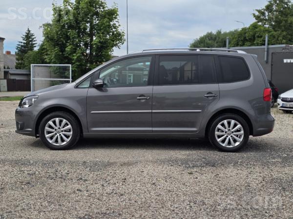 Grey Volkswagen Touran 2010 in Liepaja, with an engine capacity of 2.00 L and mileage of 298 thousand km for 5990 €, photo 8 on AUTOMOTO.COM.LV