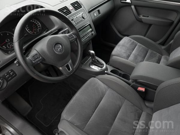 Grey Volkswagen Touran 2010 in Liepaja, with an engine capacity of 2.00 L and mileage of 298 thousand km for 5990 €, photo 9 on AUTOMOTO.COM.LV