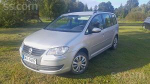 Grey Volkswagen Touran 2010 in Ogre, with an engine capacity of 1.90 L and mileage of 324 thousand km for 3300 €, photo  on AUTOMOTO.COM.LV