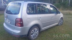 Grey Volkswagen Touran 2010 in Ogre, with an engine capacity of 1.90 L and mileage of 324 thousand km for 3300 €, photo 3 on AUTOMOTO.COM.LV