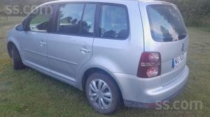 Grey Volkswagen Touran 2010 in Ogre, with an engine capacity of 1.90 L and mileage of 324 thousand km for 3300 €, photo 4 on AUTOMOTO.COM.LV