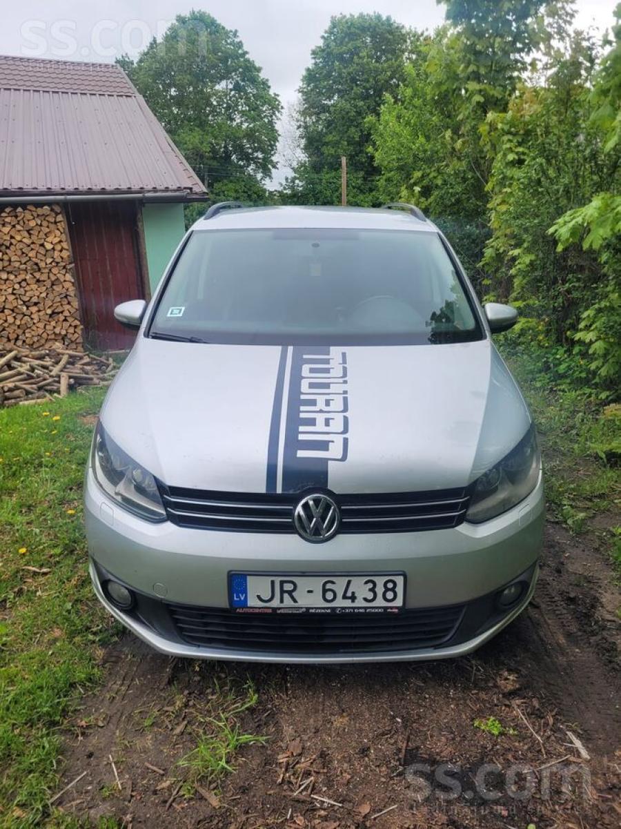 Grey Volkswagen Touran 2011 in Kraslava, with an engine capacity of 1.60 L and mileage of 0 thousand km for 5300 €, photo 1 on AUTOMOTO.COM.LV