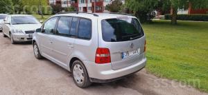 Grey Volkswagen Touran 2003 in Jekabpils, with an engine capacity of 1.90 L and mileage of 303 thousand km for 1400 €, photo 4 on AUTOMOTO.COM.LV