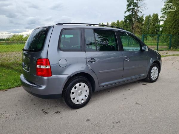 Grey Volkswagen Touran 2003 in Vilnius, with an engine capacity of 1.90 L and mileage of 261 thousand km for 2550 €, photo 9 on AUTOMOTO.COM.LV