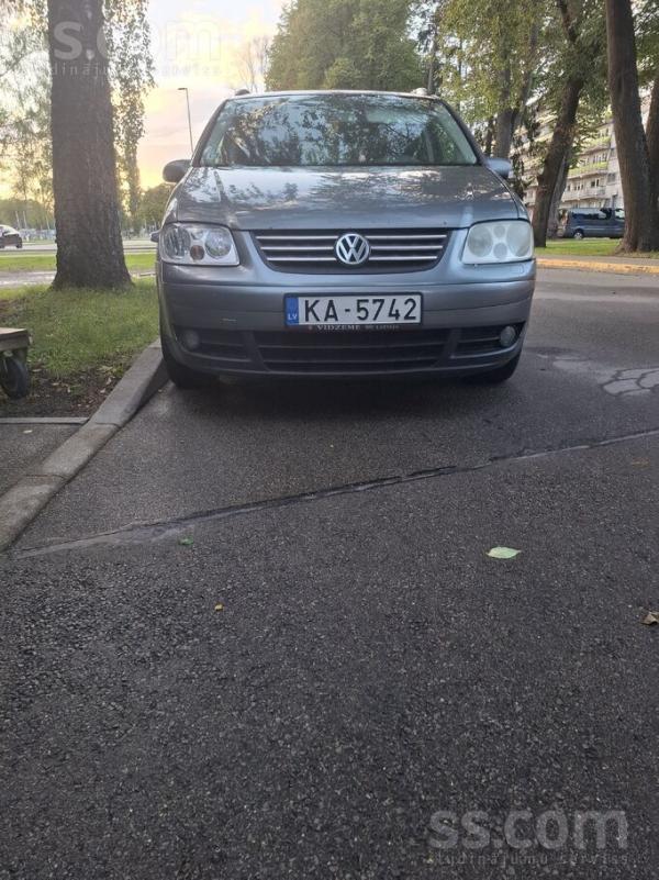 Grey Volkswagen Touran 2004 in Riga, with an engine capacity of 1.90 L and mileage of 0 thousand km for 1200 €, photo 5 on AUTOMOTO.COM.LV