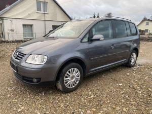 Pelēks Volkswagen Touran 2004 Biržai, ar dzinēja tilpumu 1.90 L un nobraukumu 288 tūkst. km par 2450 €, foto  vietnē AUTOMOTO.COM.LV
