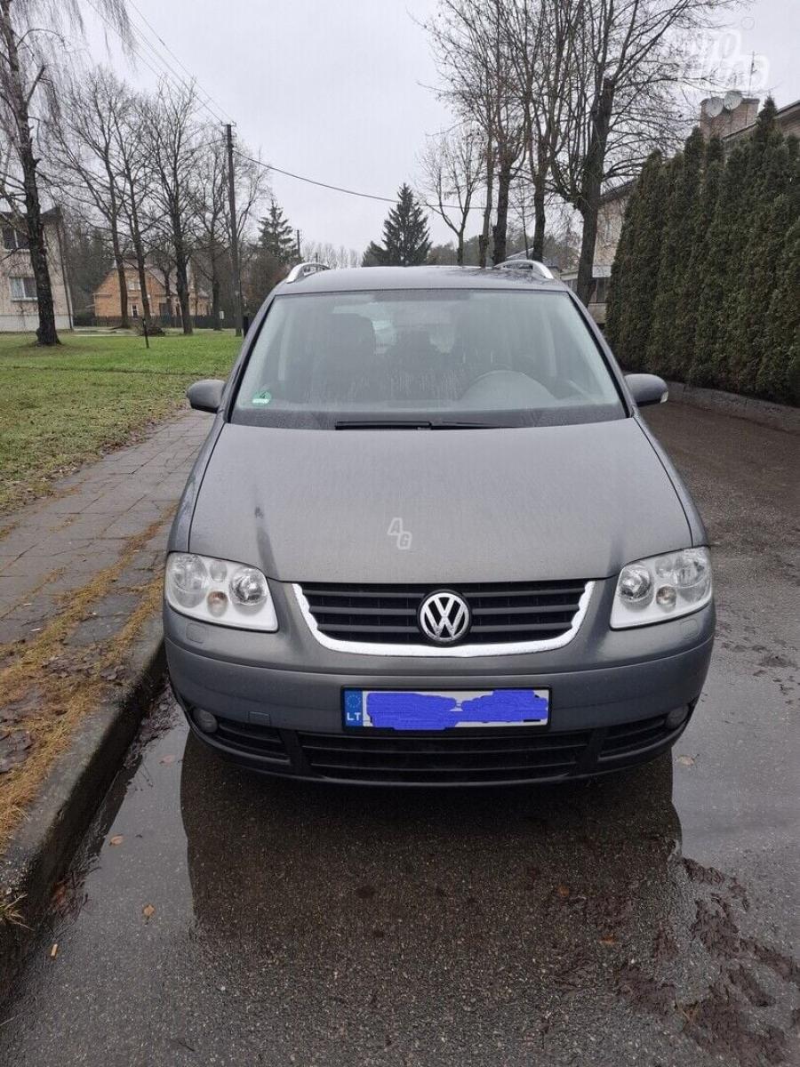 Grey Volkswagen Touran 2004 in Panevezys, with an engine capacity of 2.00 L and mileage of 299 thousand km for 2950 €, photo 3 on AUTOMOTO.COM.LV