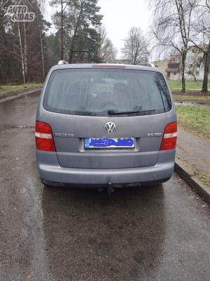 Grey Volkswagen Touran 2004 in Panevezys, with an engine capacity of 2.00 L and mileage of 299 thousand km for 2950 €, photo 5 on AUTOMOTO.COM.LV
