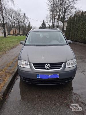 Grey Volkswagen Touran 2004 in Panevezys, with an engine capacity of 2.00 L and mileage of 299 thousand km for 2950 €, photo 7 on AUTOMOTO.COM.LV