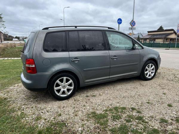 Grey Volkswagen Touran 2004 in Klaipeda, with an engine capacity of 1.90 L and mileage of 346 thousand km for 1750 €, photo 3 on AUTOMOTO.COM.LV
