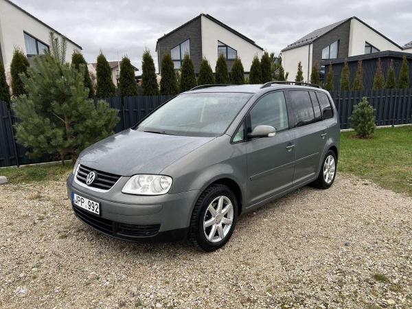 Grey Volkswagen Touran 2004 in Klaipeda, with an engine capacity of 1.90 L and mileage of 346 thousand km for 1750 €, photo 6 on AUTOMOTO.COM.LV