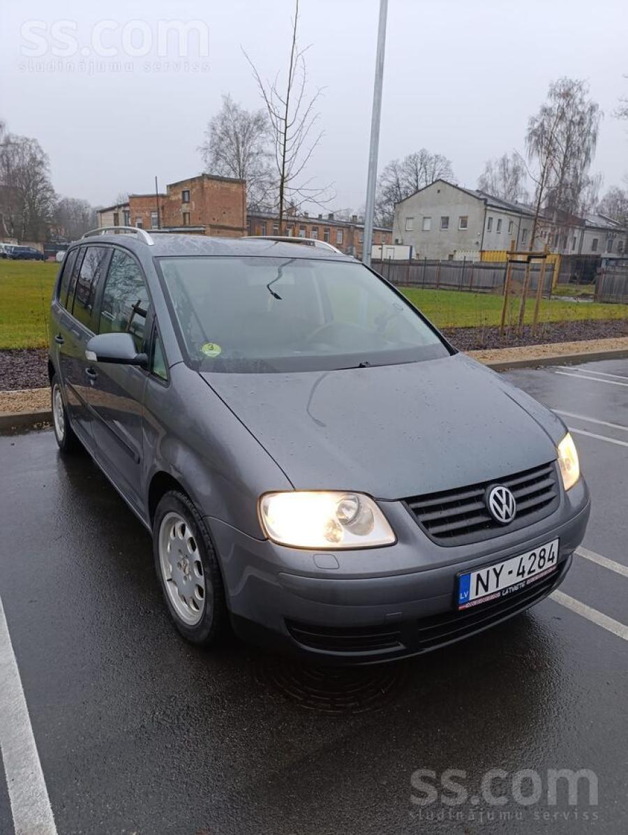 Grey Volkswagen Touran 2004 in Riga, with an engine capacity of 1.90 L and mileage of 342 thousand km for 1700 €, photo 1 on AUTOMOTO.COM.LV