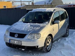 Pelēks Volkswagen Touran 2004 Šauļi, ar dzinēja tilpumu 1.97 L un nobraukumu 398 tūkst. km par 600 €, foto  vietnē AUTOMOTO.COM.LV