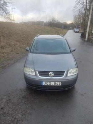 Pelēks Volkswagen Touran 2004 Viļņa, ar dzinēja tilpumu 1.90 L un nobraukumu 340 tūkst. km par 1500 €, foto  vietnē AUTOMOTO.COM.LV